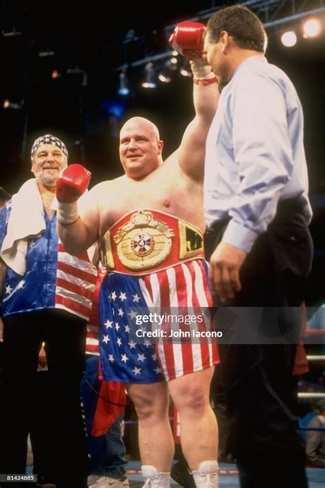 Eric Butterbean Esch Victorious Wearing Four Round Champion Trophy