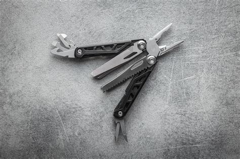 Premium Photo Multitools Pliers With Other Tools And Knife