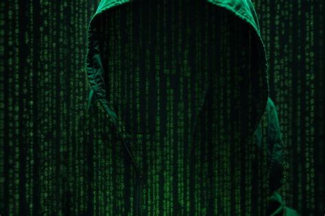 Premium Photo Hacker Prints A Code On A Laptop Keyboard To Break Into A Cyberspace