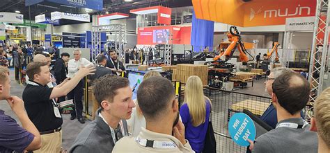 Mujin Demonstrates New Robotic Case Picking System Alongside Truckbot Automated Warehouse