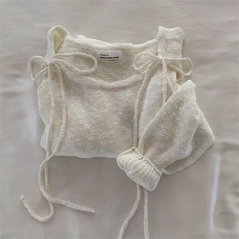 [당일출고 ] 자체제작 크치made 데이지 리본 트임 래글런 썸머 긴팔 니트 Nt 에이블리