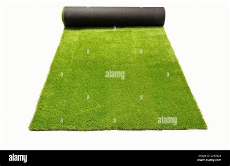 Rolled Artificial Grass Carpet Isolated On A White Studio Background