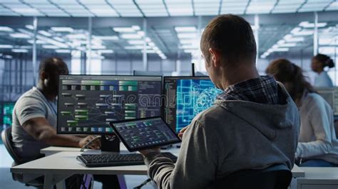 System Administrator In Data Center Solving Tasks On Tablet Stock Image