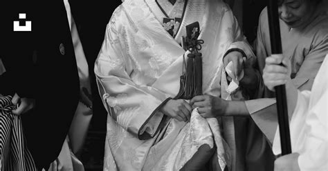Man In White Robe Holding Stick Photo Free Grey Image On Unsplash