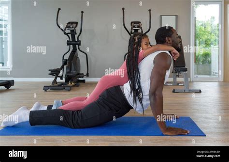 Young Short Curly Black Hair Man Push Up Exercise On Yoga Mat While The