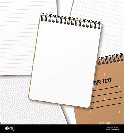 A Notebook With A Horizontal Spring Coil Lies On Top Of Another Notebook Notepad With A White