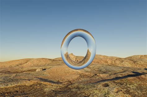 큰 빈 사막 환경에서 공중에 떠 있는 단일 유리 고리 추상적 인 초현실적 인 개념 3d 일러스트레이션 날기에 대한 스톡 사진 및 기타 이미지 Istock