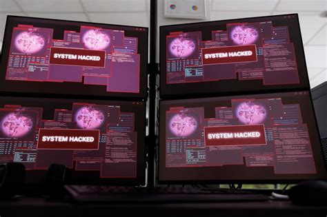 Premium Photo Computers Displaying Hacked System Alert Message Flashing On Monitor Showing