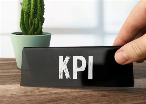 Premium Photo Text Kpi Writen On Black Table Card