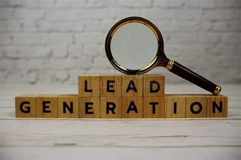 Lead Generation With Wooden Blocks Alphabet Letters And Magnifying Glass On Wooden Background