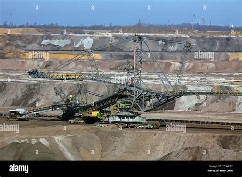 Brown Coal Lignite Being Extracted By Huge Excavators At Open Pit Mine Saxony Anhalt Germany
