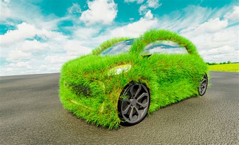 잔디로 덮인 전기 자동차에서 녹색 운전 스타일과 제로 방출 전기 자동차 대체 연료 자동차에 대한 스톡 사진 및 기타 이미지 전기 자동차 대체 연료 자동차 전기 자동차