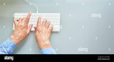 Two Hands Of Female Senor Write On Computer Keyboard Stock Photo Alamy