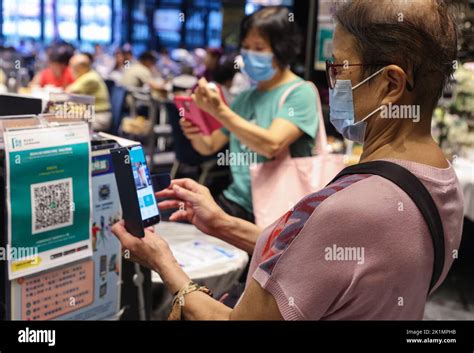 customers scans the hheavehomesafe a contact tracing app qr code walking into restaurants