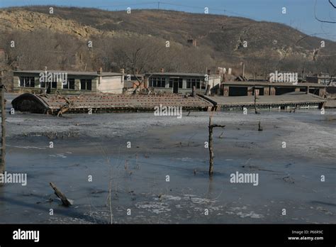 Mining Subsidence Houses Sunk Vertically Into The Ground Through