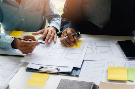Ux Or Ui Designers Designing On Their Smartphone Application Layout Prototype Project Stock