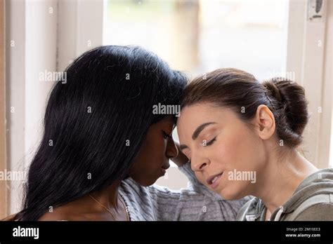 Consolation By Two Different Ethnic Friends In A Moment Of Despair