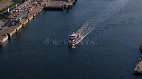 Aerial View Of A Boat Leaving The Harbor In Kiel Germany The Ferry Is