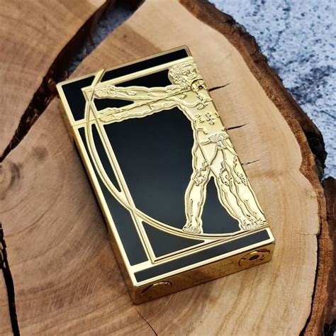 پشت فندک اس تی دوپونت St Dupont مدل داوینچی فروشگاه ساعت مچی تمپوواچ و ست هدیه فندک