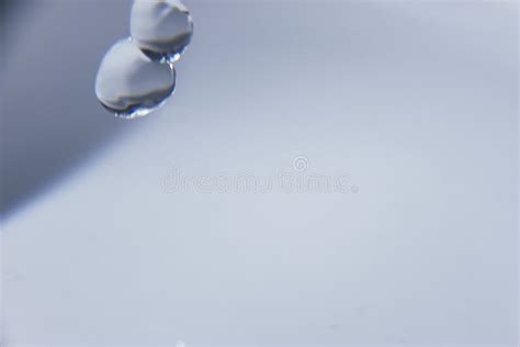 151one Or More Drops Of Water Splashing Into Waves And Undefined Shapes Wallpaper Stock Image