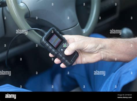 Auto Mechanic Using Car Diagnostic Scanner Tool Stock Photo Alamy