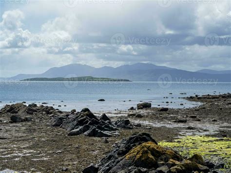 View Of Inchmarnock Island And Arran From The Isle Of Bute Scotland