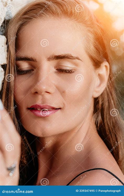 Woman Flowers Portrait Close Up A Woman With Closed Eyes Is Pictured With Flowers In Her Hair