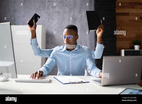 Multitasking Workload Of Happy Busy Man Worker In Office Stock Photo Alamy