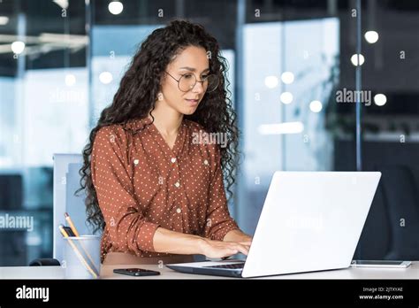 beautiful indian woman programmer web developer focused and confident