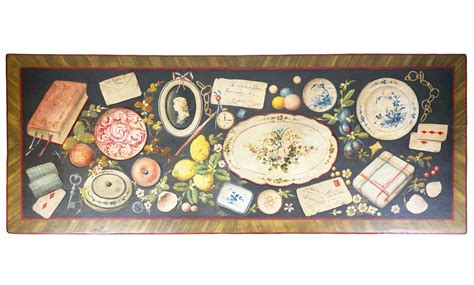 An Italian Renaissance Style Long Table With Trompe Loeil Designs