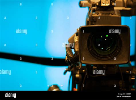 Close Up Of A Television Camera Lens In A Blue Screen Studio Environment Stock Photo Alamy