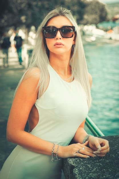 Premium Photo Young Woman Wearing Sunglasses