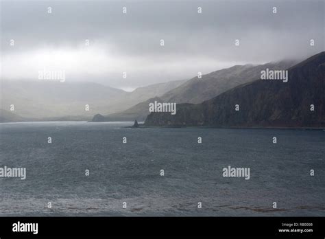 Heavy Clouds And Rain Over The Bering Sea Coast Of Unalaska Island In