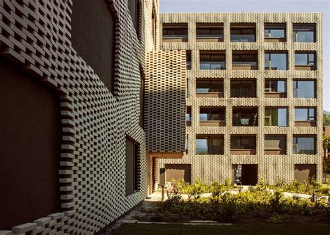 Brick Pixel Patchwork Envelops Housing By Buzzi Studio Di Architettura