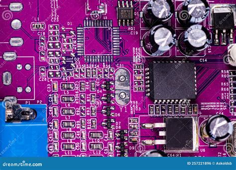 Macro Closeup Shot Of Microchip On Red Printed Circuit Board Computer