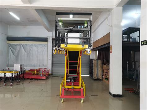 Continuous Vertical Transfer Conveyor System For Cartons Bags Pallet