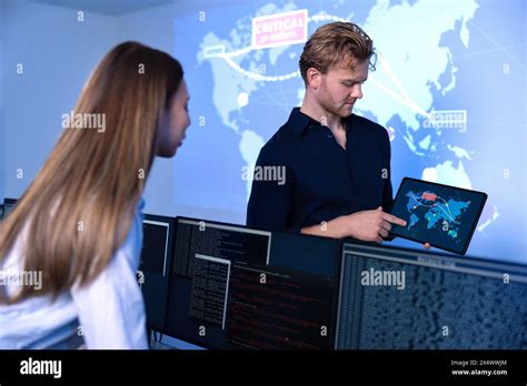 Cyber Security Team Working In A Cyber Security Operations Center Soc To Protect Systems And