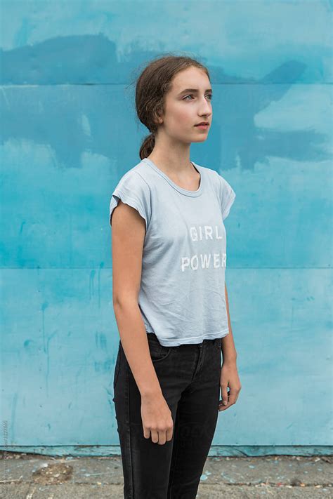Portrait Of Thirteen Year Old Girl Wearing Girl Power Tee Shirt By Stocksy Contributor