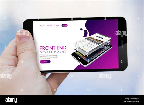 Hand Holding A Front End Development Website On Smartphone Screen Screen Graphics Are Made Up