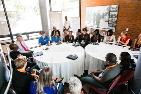 Diverse Students Attending A Networking And Leadership Workshop