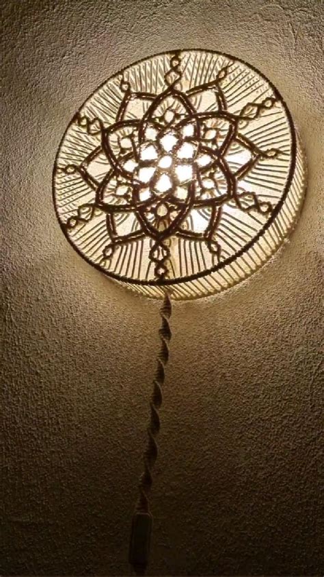 Круглый настенный светильник бра в технике макраме