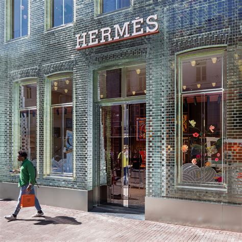 gridded steel facade evokes bamboo forest at hermès store in tokyo