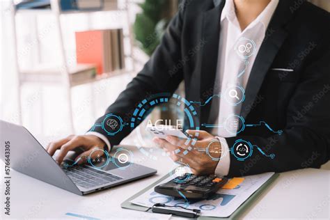 Agile Development Methodology Concept Business Hand Using Laptop Computer And Smartphone With