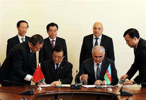 贺国强在阿塞拜疆出席有关协议签字仪式
