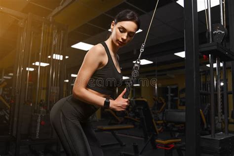Athletic Girl Working Out In Gym Fitness Woman Doing Exercise Stock