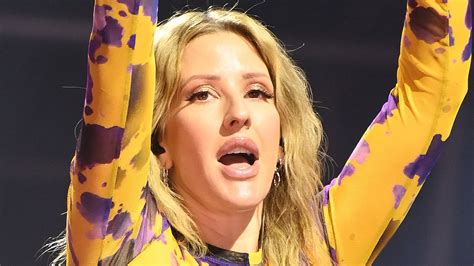 Ellie Goulding Shows Off Her Abs In Bold Crop Top And Matching Leggings