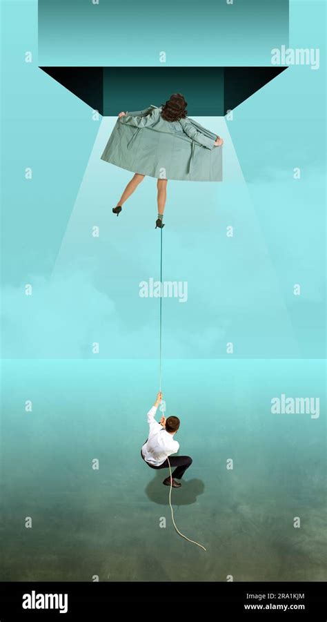 Woman Flying Upwards To New Life And Man Holding Her With String