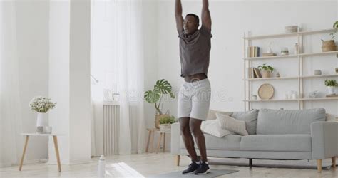 Active Cardio Workout Close Up Portrait Of Young Man With Naked Muscular Torso Doing Jumping