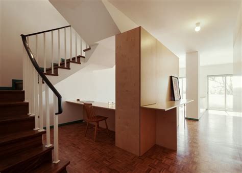 Wooden Structures Combine Partitions And Furniture In Portugal Home