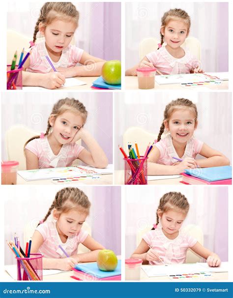 A Collection Of Classroom Scissors Upside Down In A Rack Stock